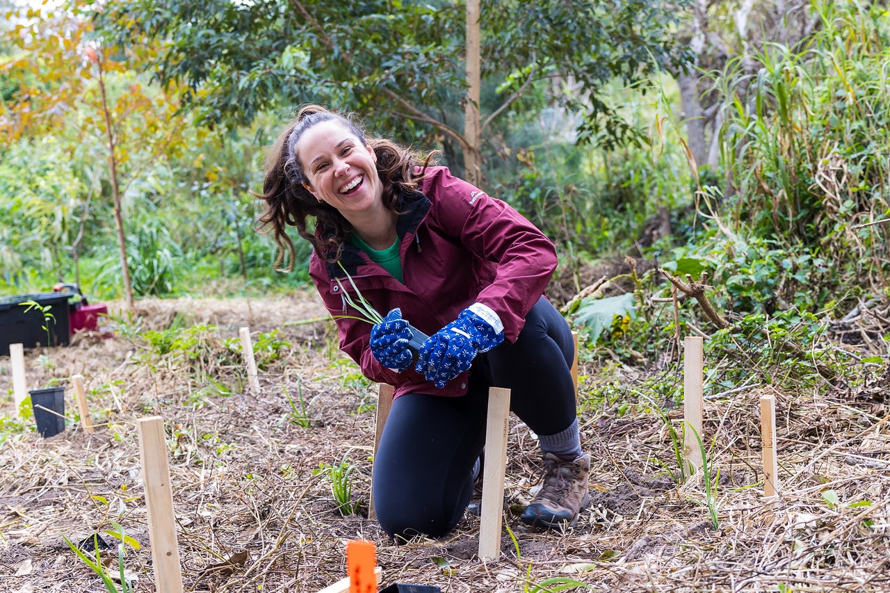 Happy_volunteer_on_tree_day__1_.jpg?q=50&auto=compress&w=1